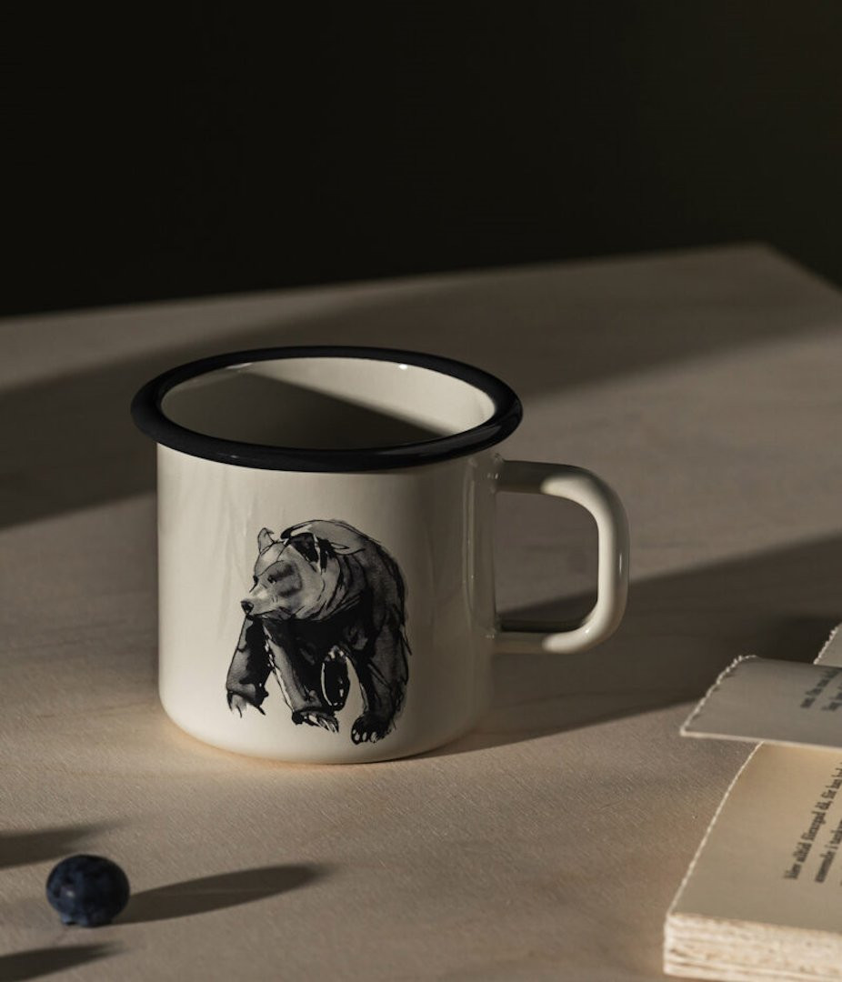 Muurla enamel mug with illustrations inspired by Finnish nature.